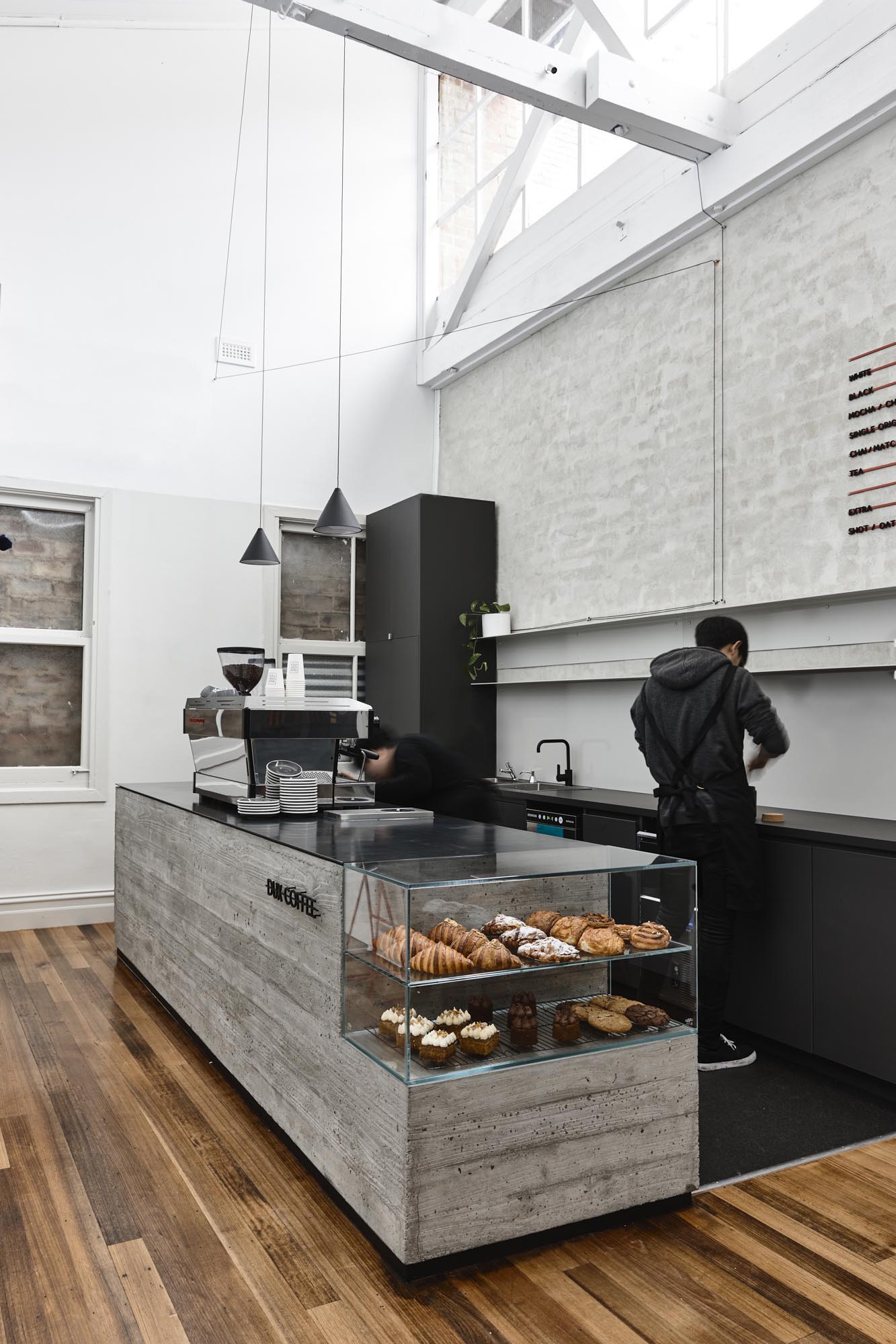 "Monolithic" concrete bar features in tiny coffee shop from Pierce ...