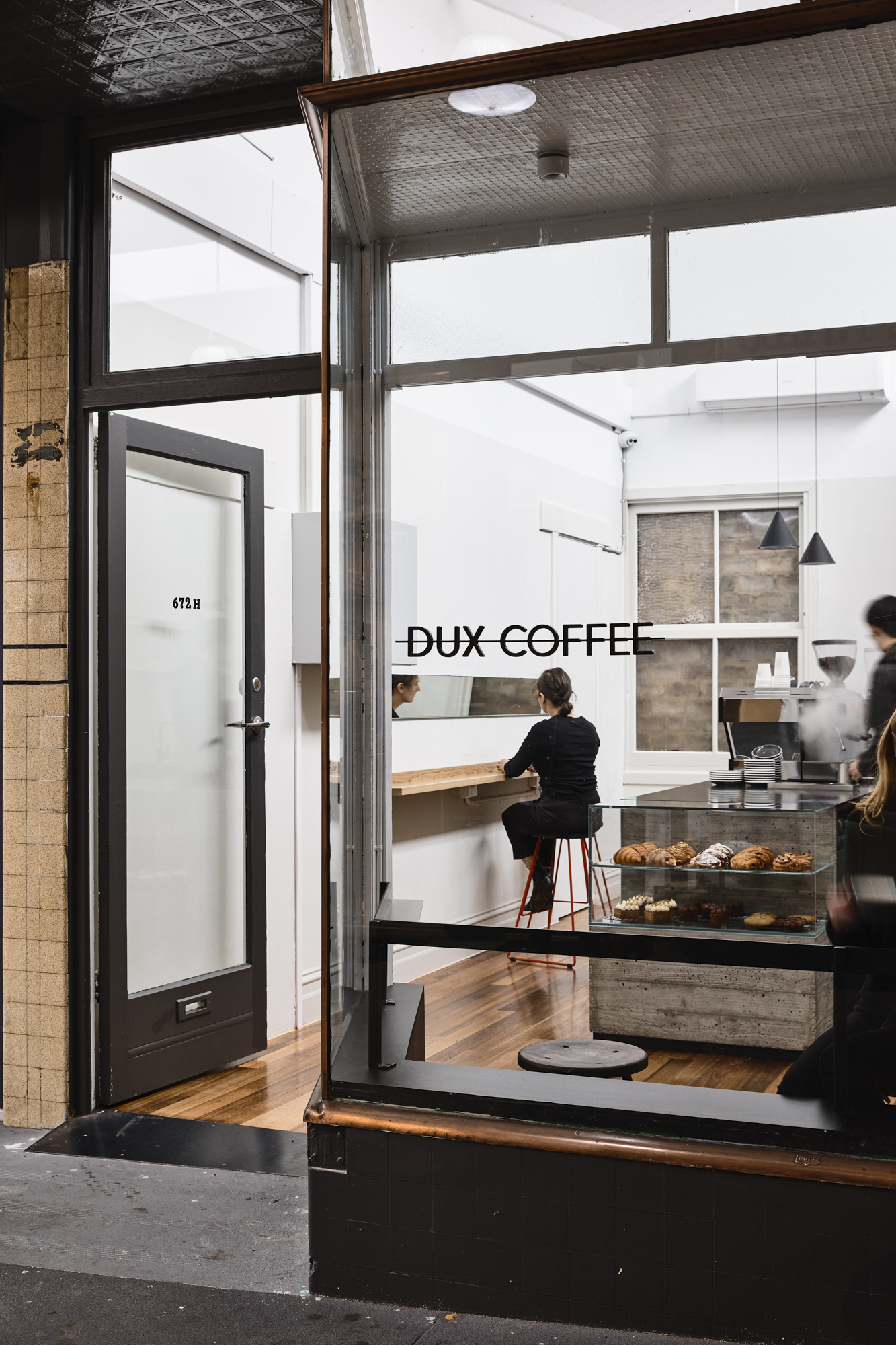 "Monolithic" concrete bar features in tiny coffee shop from Pierce ...