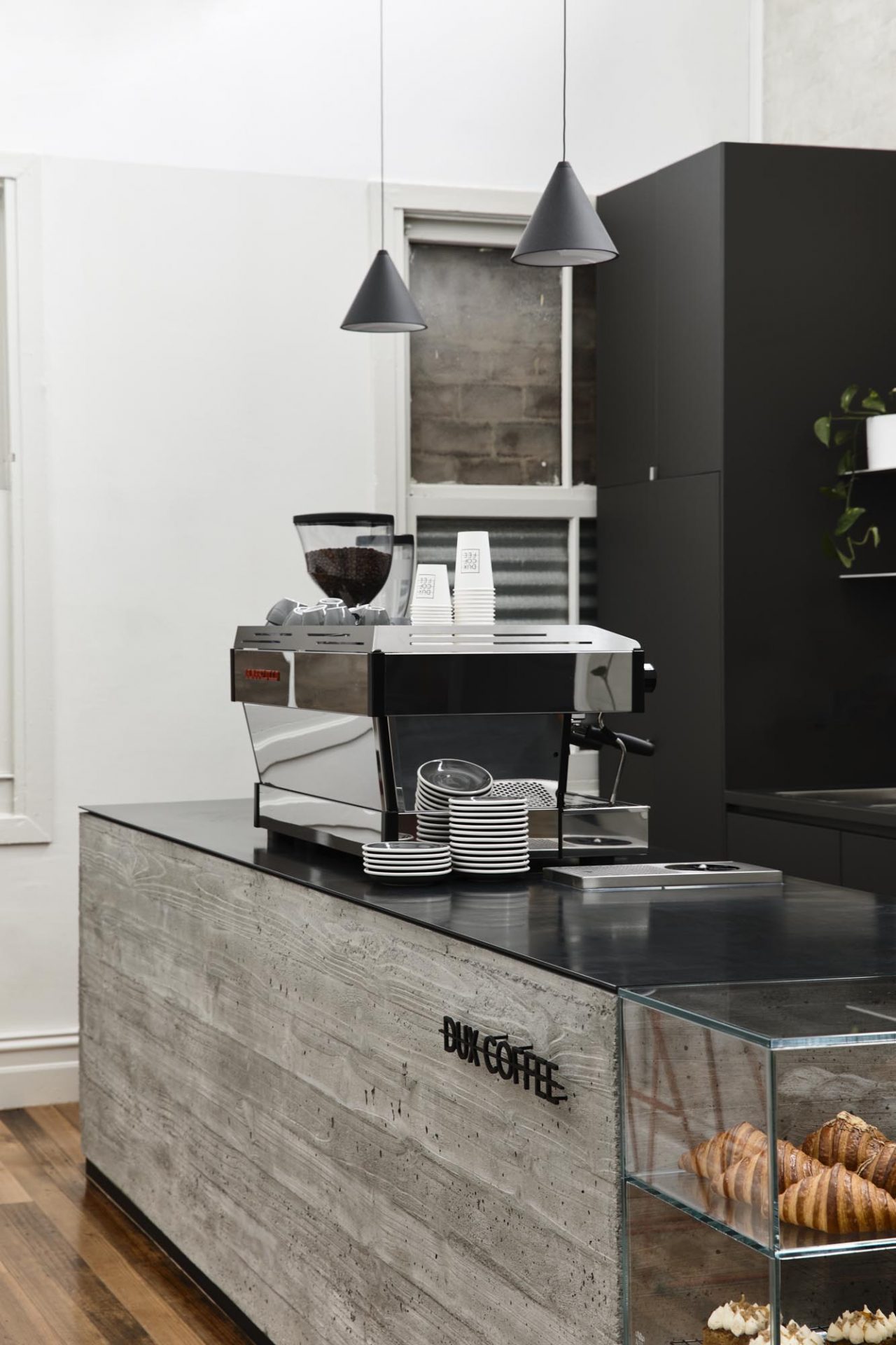 "Monolithic" concrete bar features in tiny coffee shop from Pierce ...