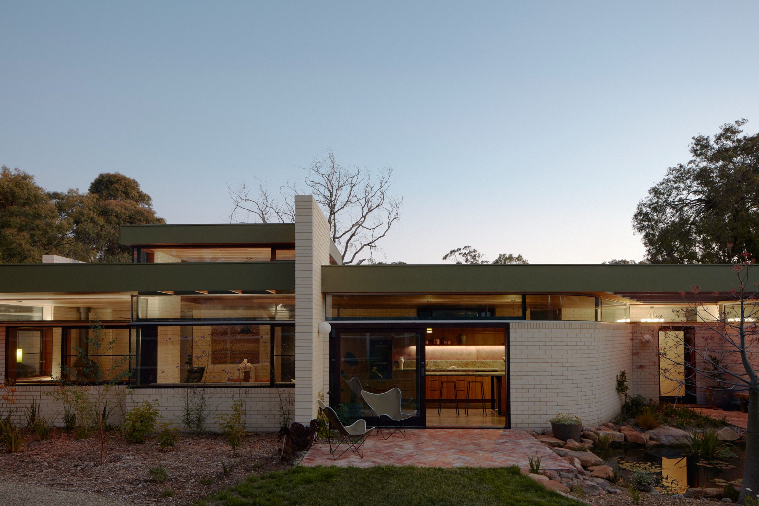 Nest Architects and Placement clad Victorian home in white bricks and ...